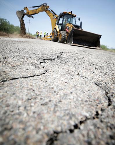 Storm damage to highway from fissures will require extensive repairs ...