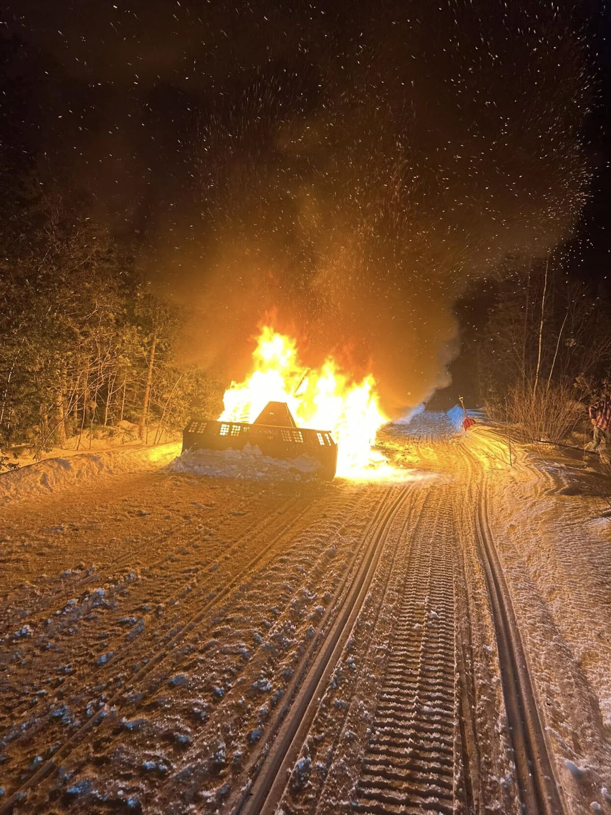 Tahquamenon Area Snowmobile Association tractor starts on fire on trail ...
