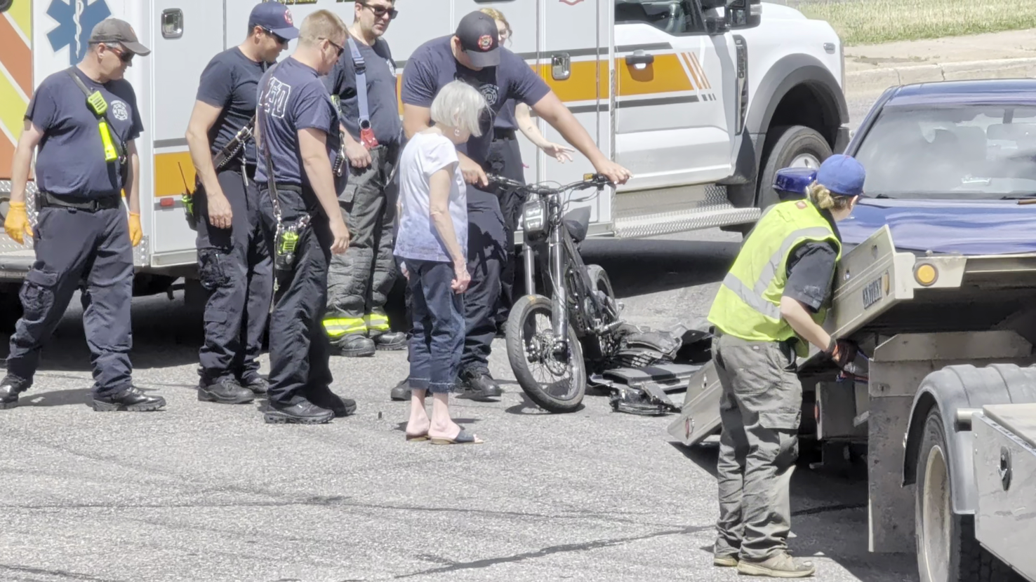 Bike vs car crash reroutes traffic on Marquette's West Washington ...