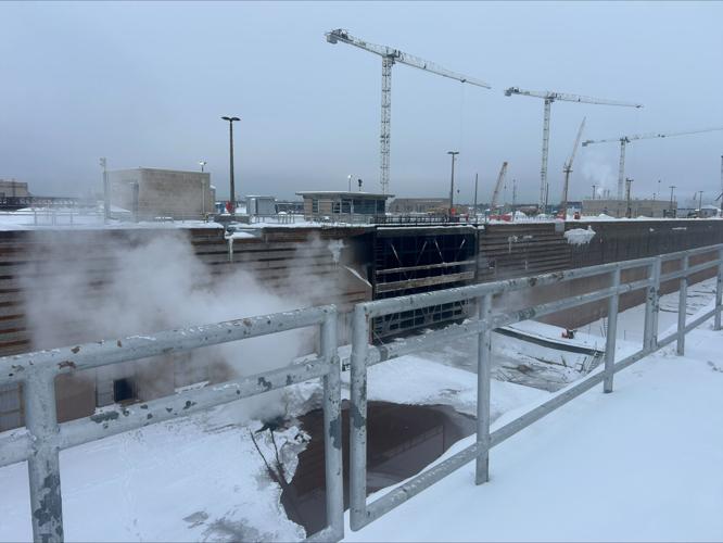 All locked up: winter maintenance efforts inside the Soo Locks | News ...
