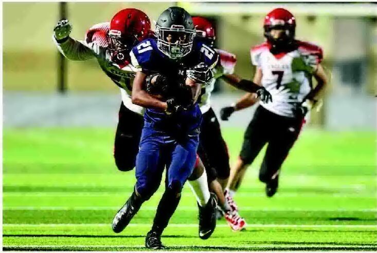 Grizzlies rush for 299 to give head coach first win