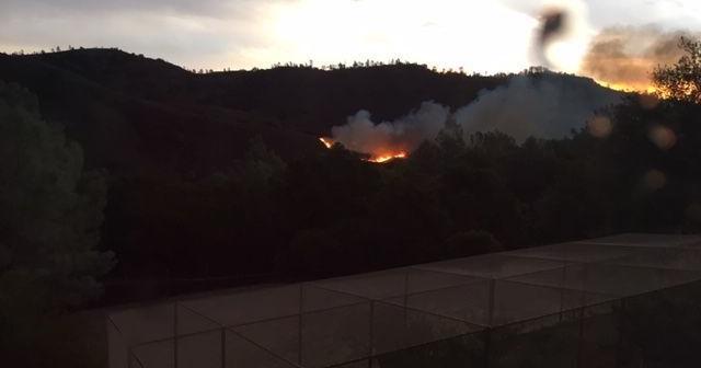 Where did the Hennessey Fire begin? This resident says on her property ...