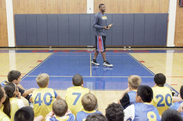 Warriors' Festus Ezeli shares words of wisdom at Justin-Siena