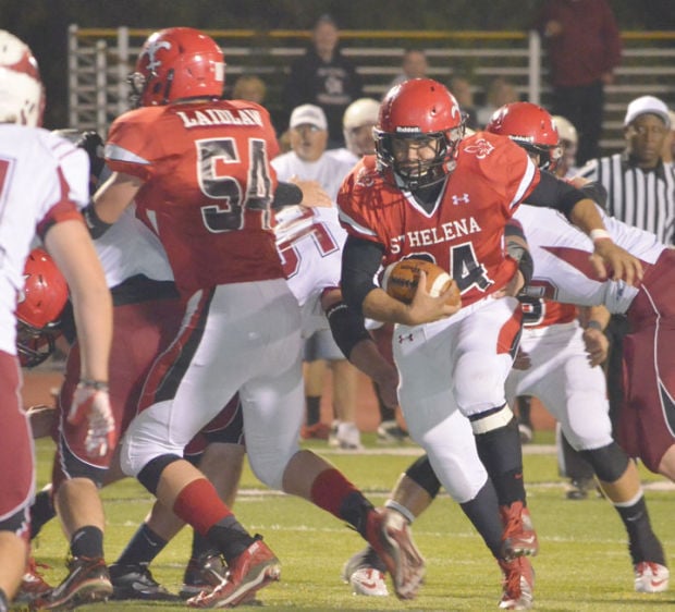 Varsity Football: Saints cruise by Clear Lake