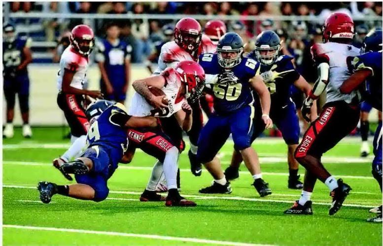 Grizzlies rush for 299 to give head coach first win