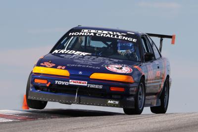 Krider wins first race of season and breaks track record