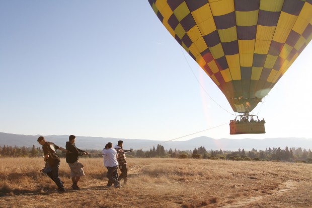 From solid ground, chase crews keep hot air balloons aloft