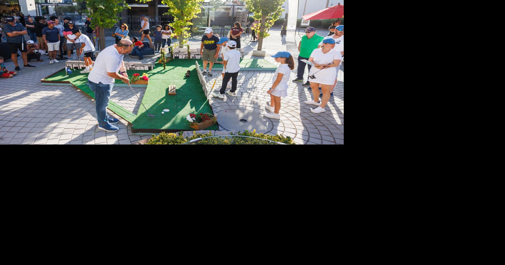 Napa leaders take part in Putting Challenge before PGA event