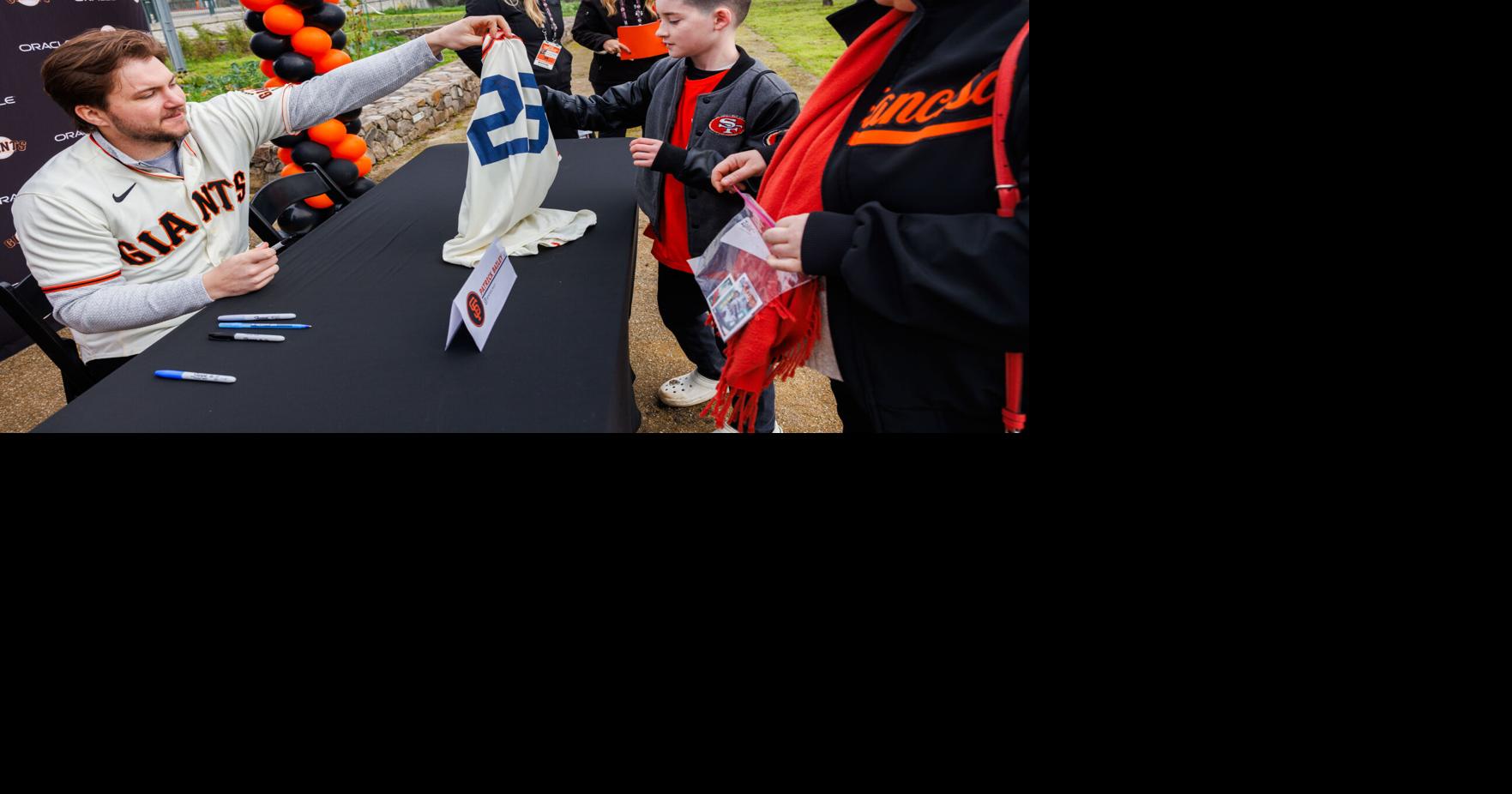 Giants FanFest baseball event has trophy display, interviews
