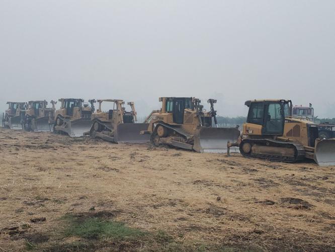 With Cal Fire resources scarce, volunteers in bulldozers helped save ...