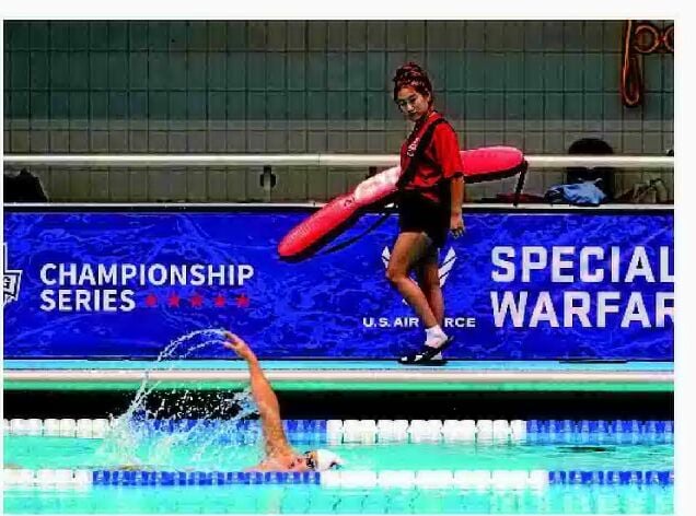 A salute to lifeguards, who are even needed at the Olympic pool