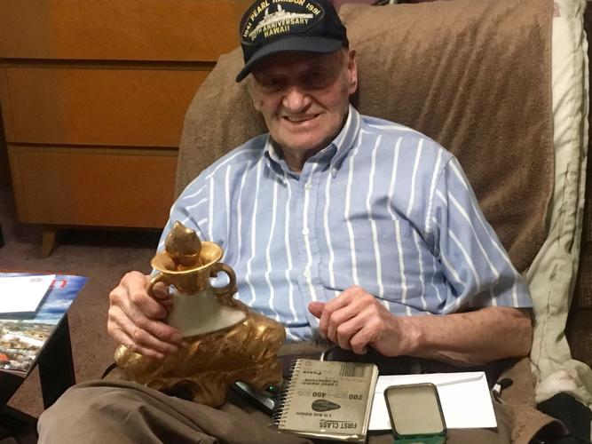 Decanters and displays — memorabilia of a full life for a Pearl Harbor ...