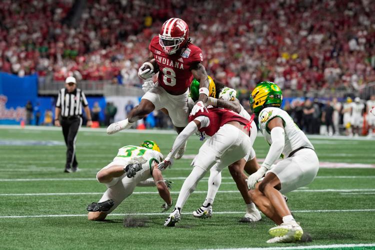No. 1 Indiana adds to CFP dominance with 56-22 Peach Bowl win over No ...