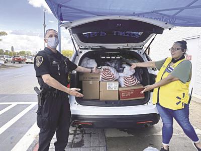 Donors fill police cruisers with school supplies | Local News ...
