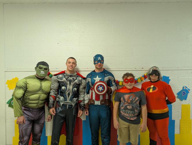 Living the superhero life: Union student honored with parade ...