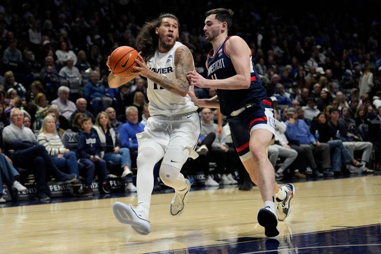 No. 4 UConn beats Xavier 90-67 behind Mullins and Karaban | National ...