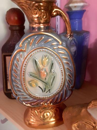 Decanters and displays — memorabilia of a full life for a Pearl Harbor ...