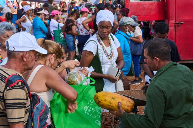 Cubans struggle to survive on pocket-size government ration books as ...