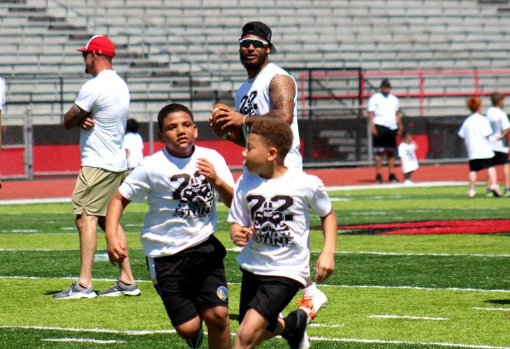 Stone's football camp a 'surreal' moment | Local Sports | ncnewsonline.com