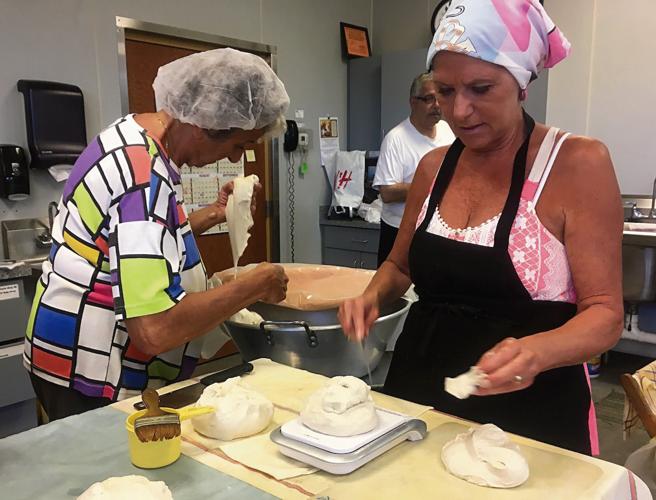 No loafing: Team effort goes into bread making at St. Elias Church ...