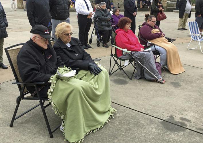 Dozens brave chill for community Easter service | Local News ...