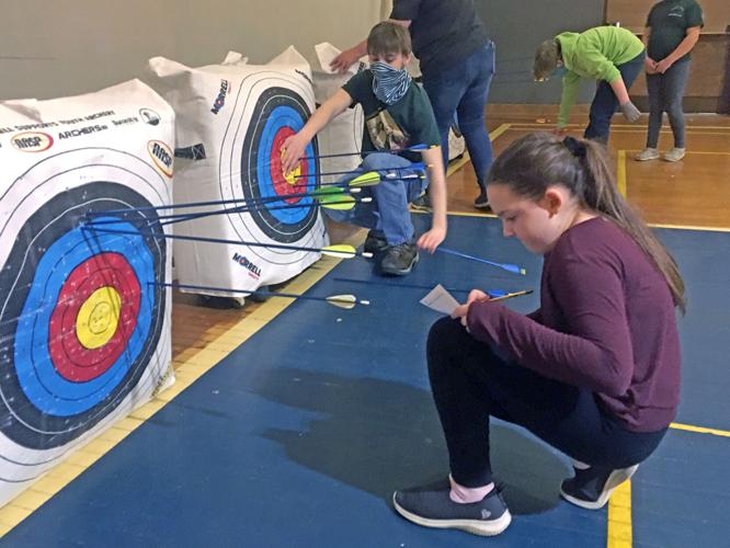 Local faith-based schools embrace archery | News | ncnewsonline.com