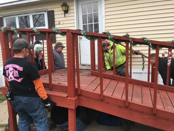 Pulaski firefighters carry man's singed wheelchair ramp to his new home ...
