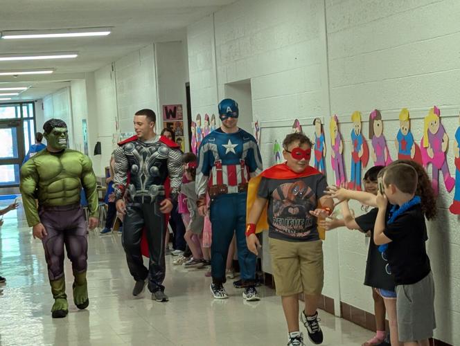 Living the superhero life: Union student honored with parade ...