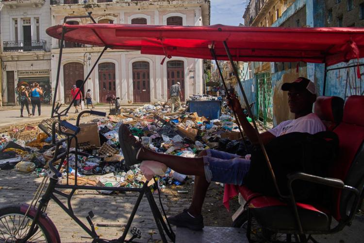 A garbage crisis engulfs Havana as fuel shortages stall trash pickup ...