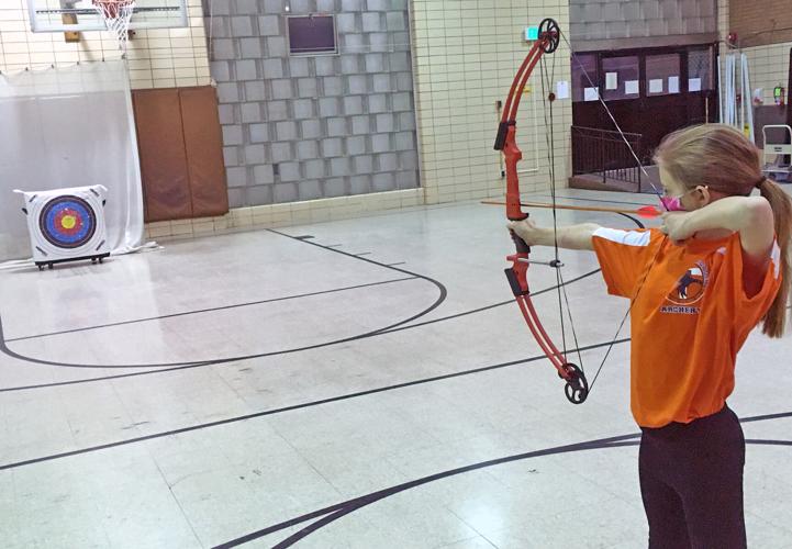 Local faith-based schools embrace archery | News | ncnewsonline.com