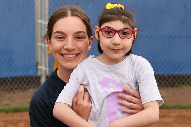 Softball teams raise funds to aid local youth | Local News ...