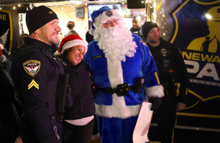 'Sgt. Santa' helps Newark Police officers hand out presents | News ...