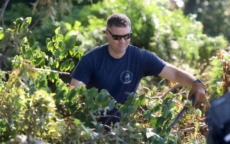 Volunteers help clean up storm debris in Brookside, Cherokee Woods ...