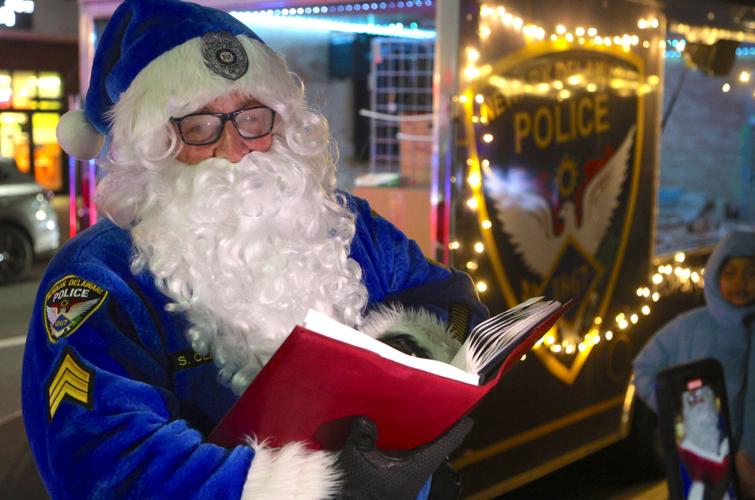 Sgt. Santa hands out presents on Main Street | News Gallery ...
