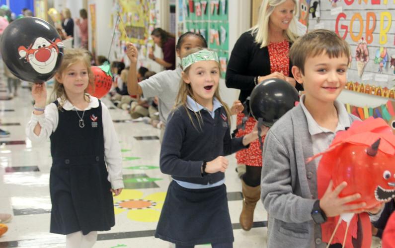 Newark Charter second-graders hold Thanksgiving balloon parade | News ...