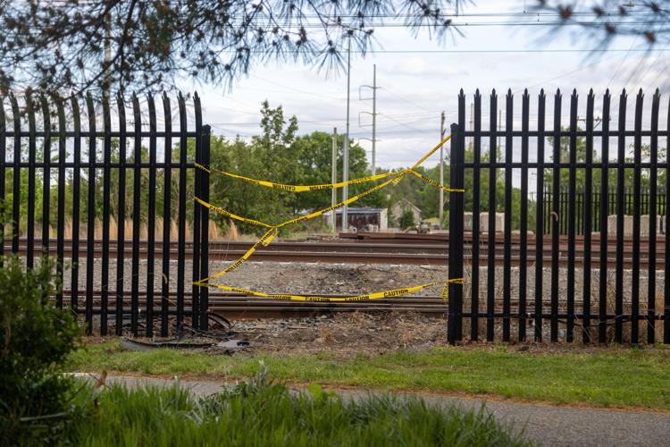 Police: Drunken driver crashed through fence, drove on to train tracks ...