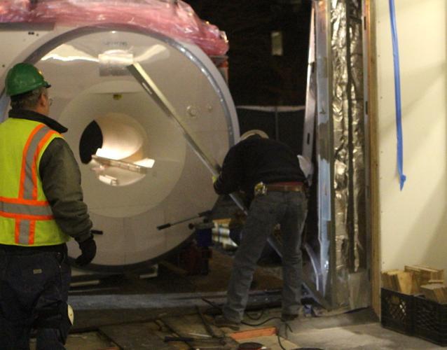 Crane delivers 'cutting-edge' MRI machine to UD building | News ...