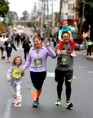 Rain and wind can't stop annual Main Street Mile | News ...
