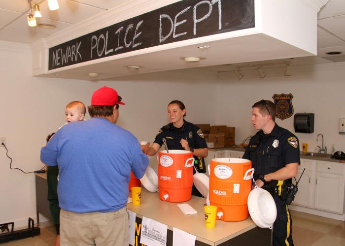 Newark Police officers hand out free water ice | News ...