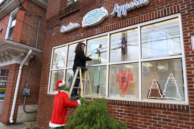 The Grinch visits Newark for Small Business Saturday | News ...