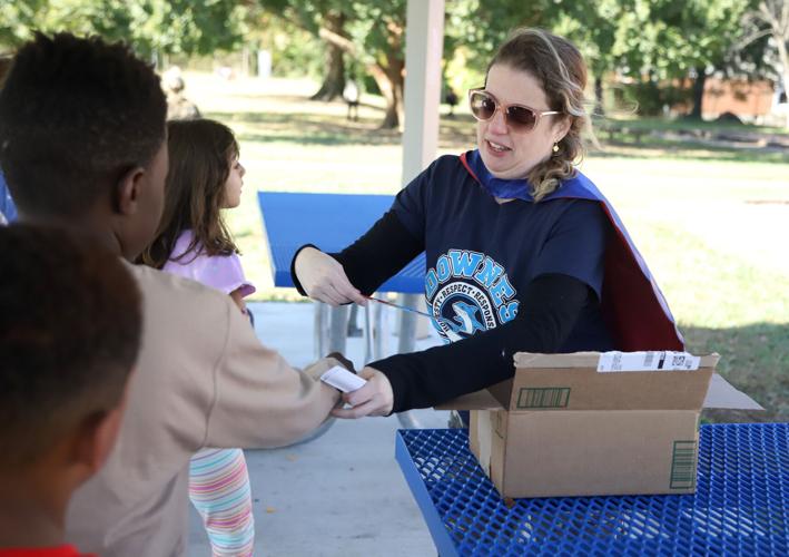 Downes Elementary 'superheroes' raise $18,000 during annual walkathon ...