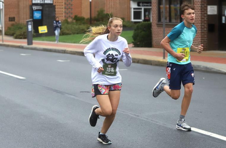 Rain and wind can't stop annual Main Street Mile | News ...