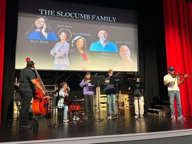 Author visits Newark Charter, performs with orchestra students | News ...