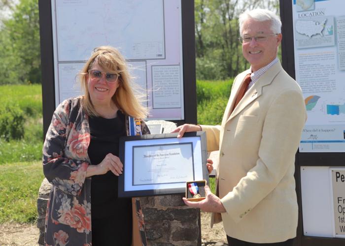Archeologist honored for his work researching Cooch’s Bridge ...
