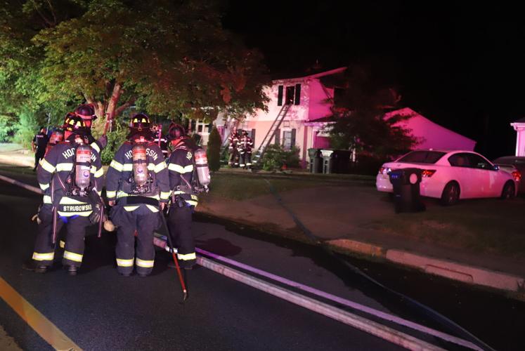 Newark firefighter escapes injury after partially falling through floor ...