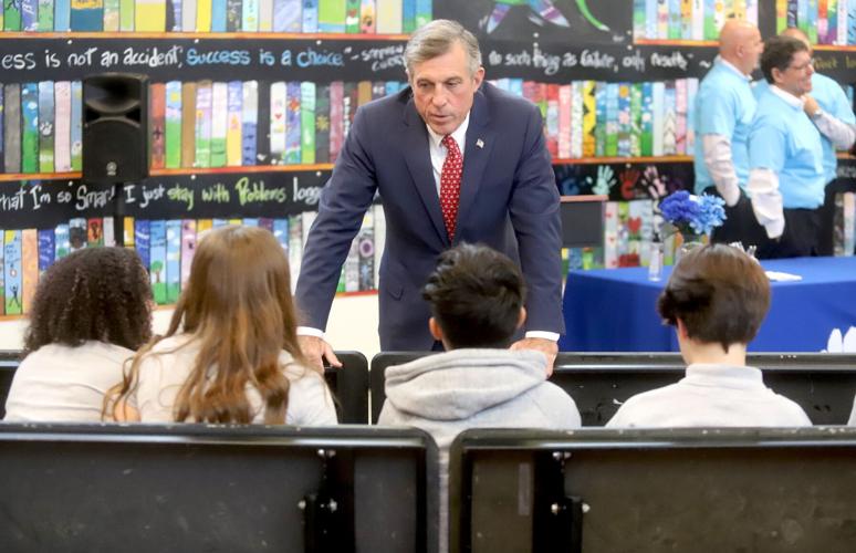 Carney signs dinosaur bill written by Shue-Medill students | News ...