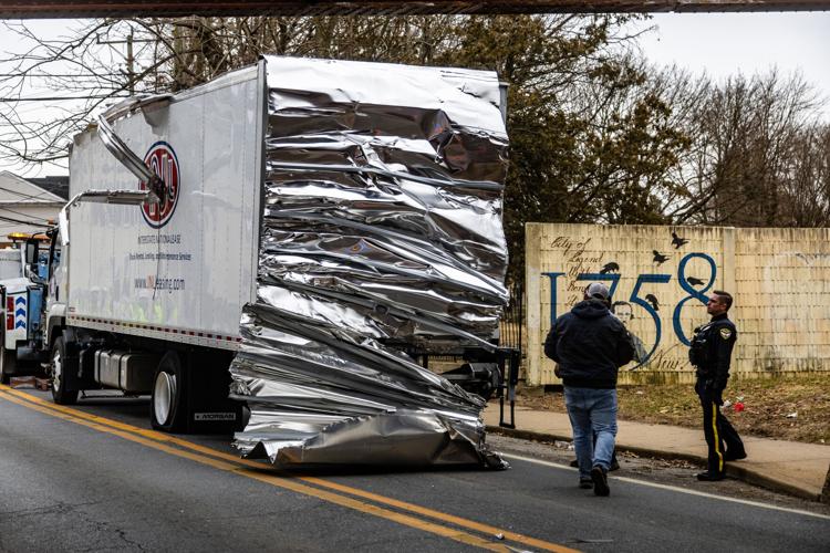 Driver cited after getting truck stuck under North Chapel Street bridge ...