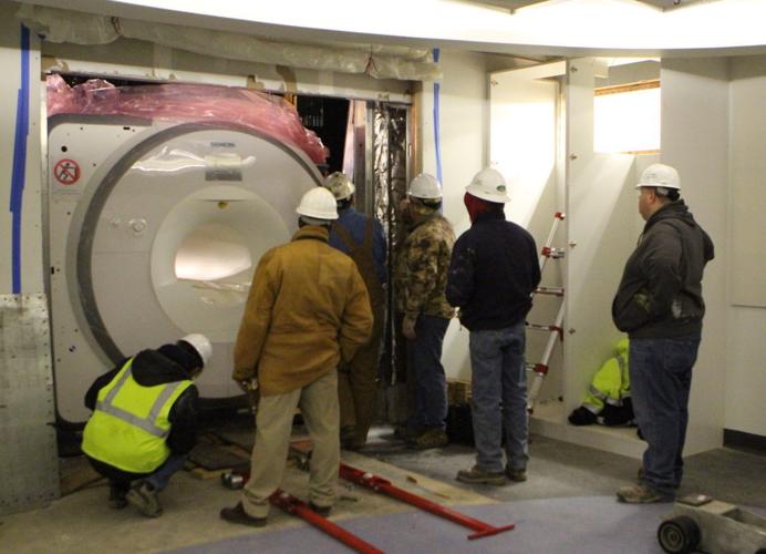 Crane delivers 'cutting-edge' MRI machine to UD building | News ...