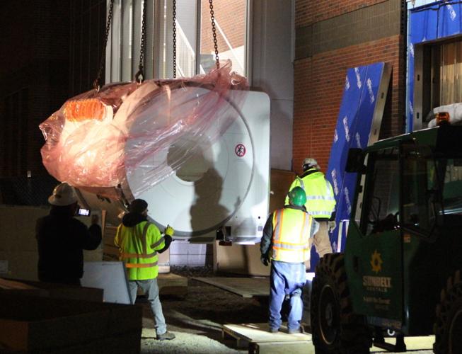 Crane delivers 'cutting-edge' MRI machine to UD building | News ...