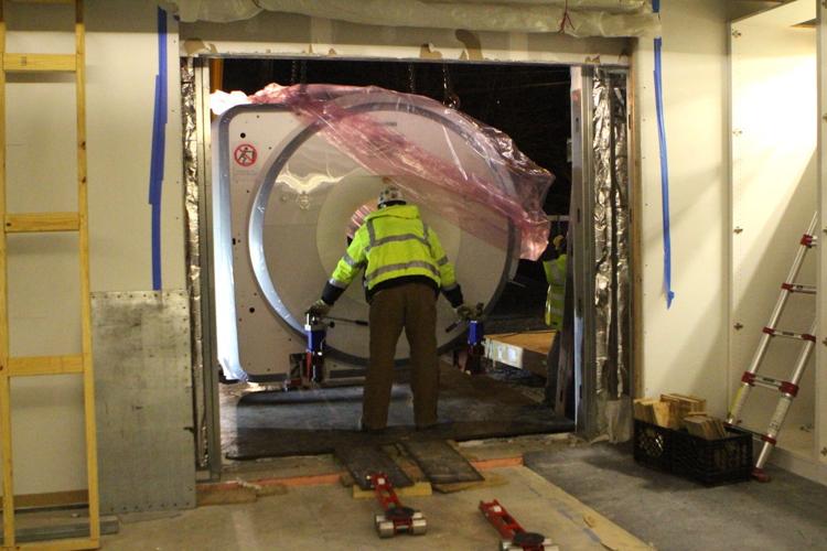 Crane delivers 'cutting-edge' MRI machine to UD building | News ...